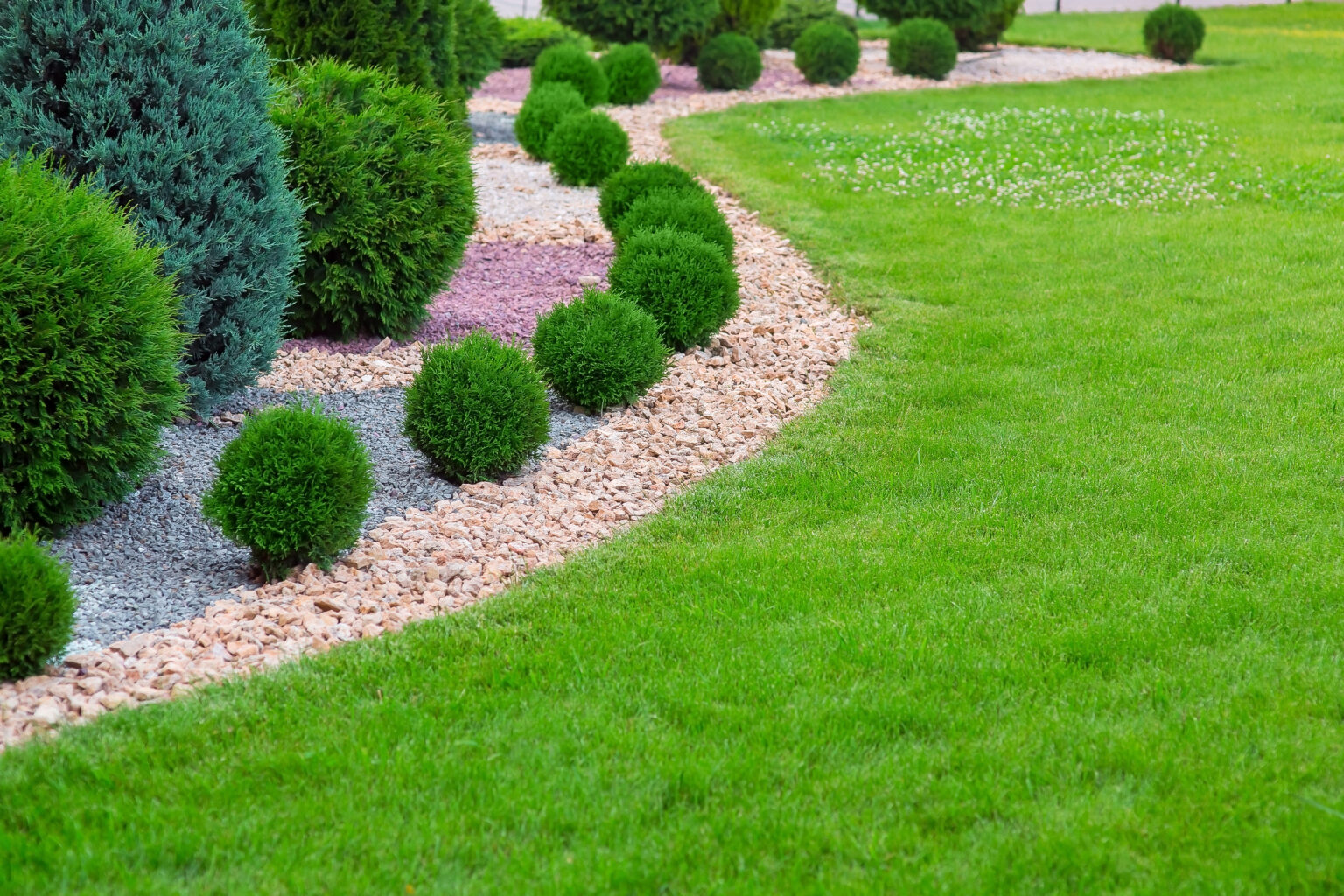 Using Gravel for Low-Maintenance Landscaping This Summer - HK Contractors